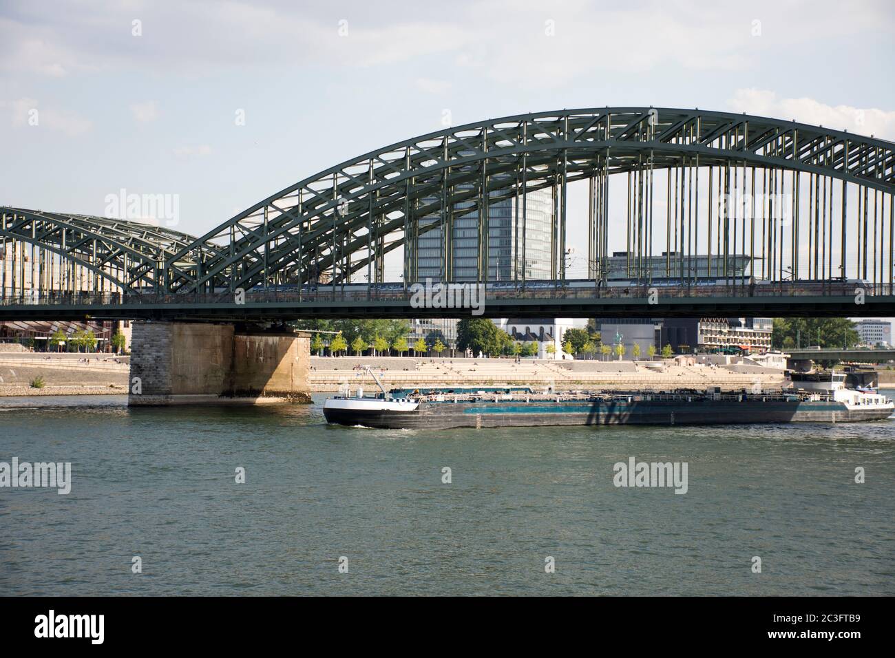 German people sailing barge and tugboat cargo ship in rhine river at ...