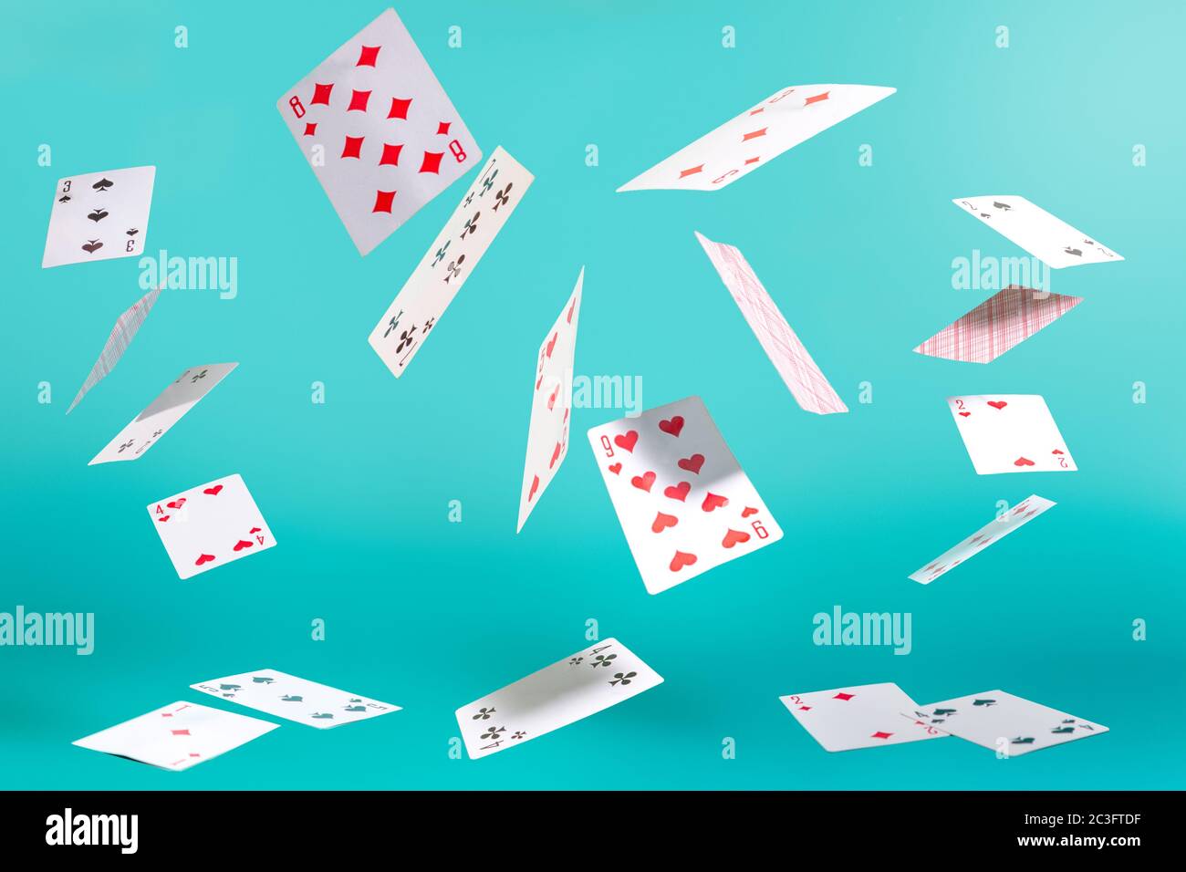 Flying cards hi-res stock photography and images - Alamy