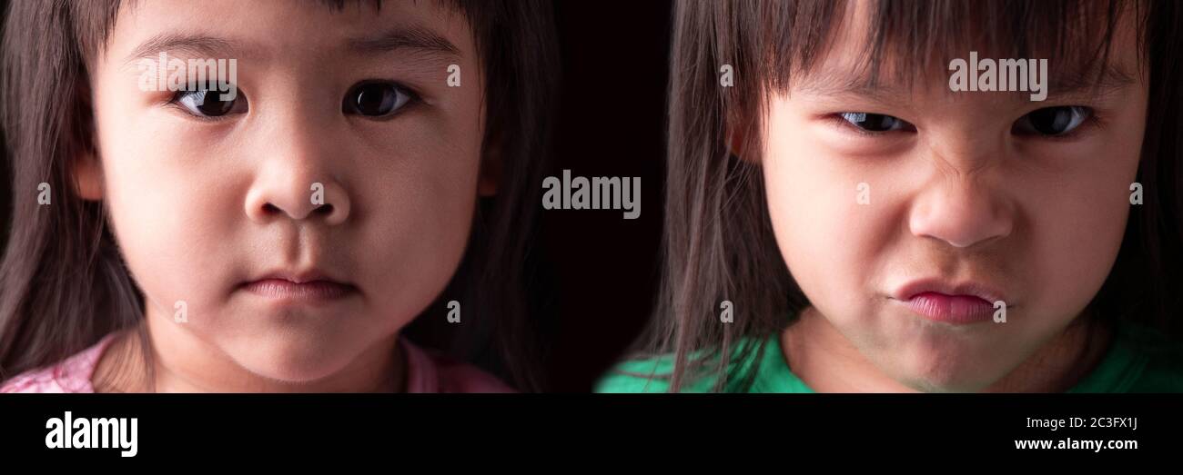 Portrait half face of Asian sibling child girls with sad and angry ...