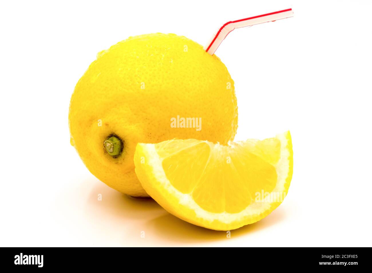 Isolated lemon juice. A whole and a half of lemon with straw, concept ...