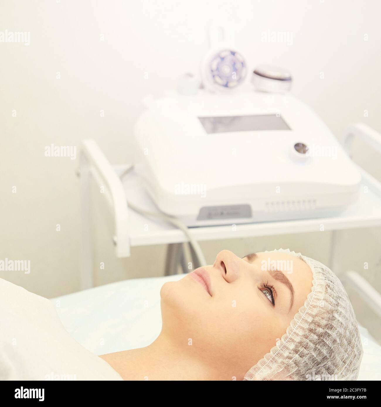 Facial micro current cosmetology procedure. Beauty technology treatment ...