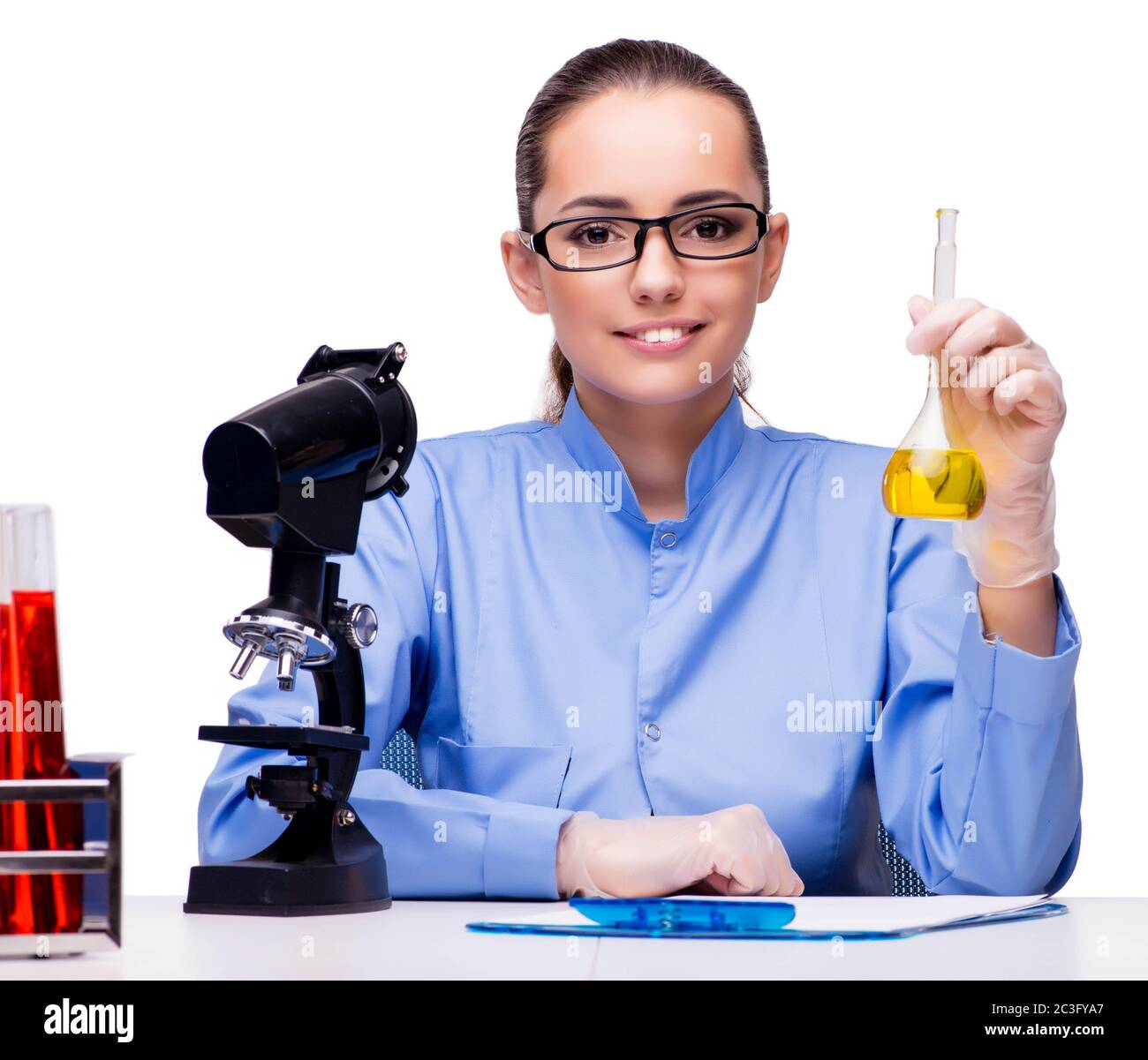 Lab chemist working with microscope and tubes Stock Photo - Alamy