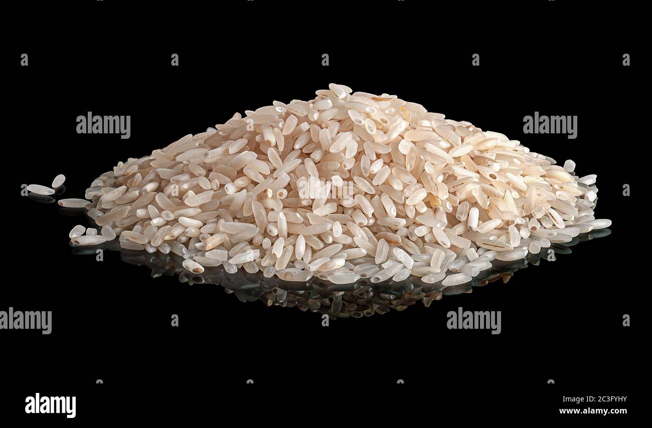 Pile white rice with reflection Stock Photo - Alamy