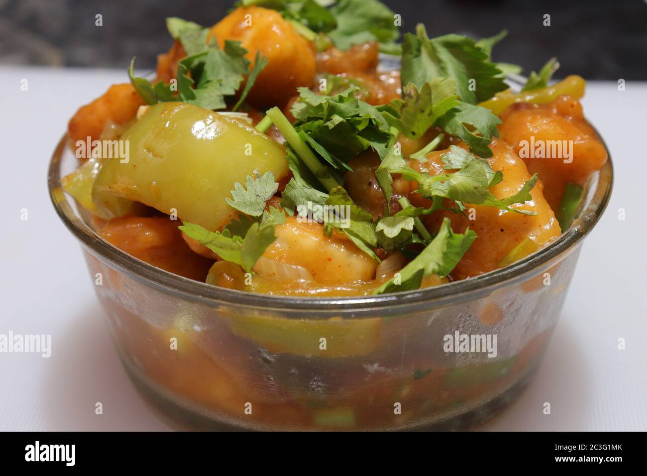 Paneer Manchurian or Paneer 65 in bowl at black concrete background ...