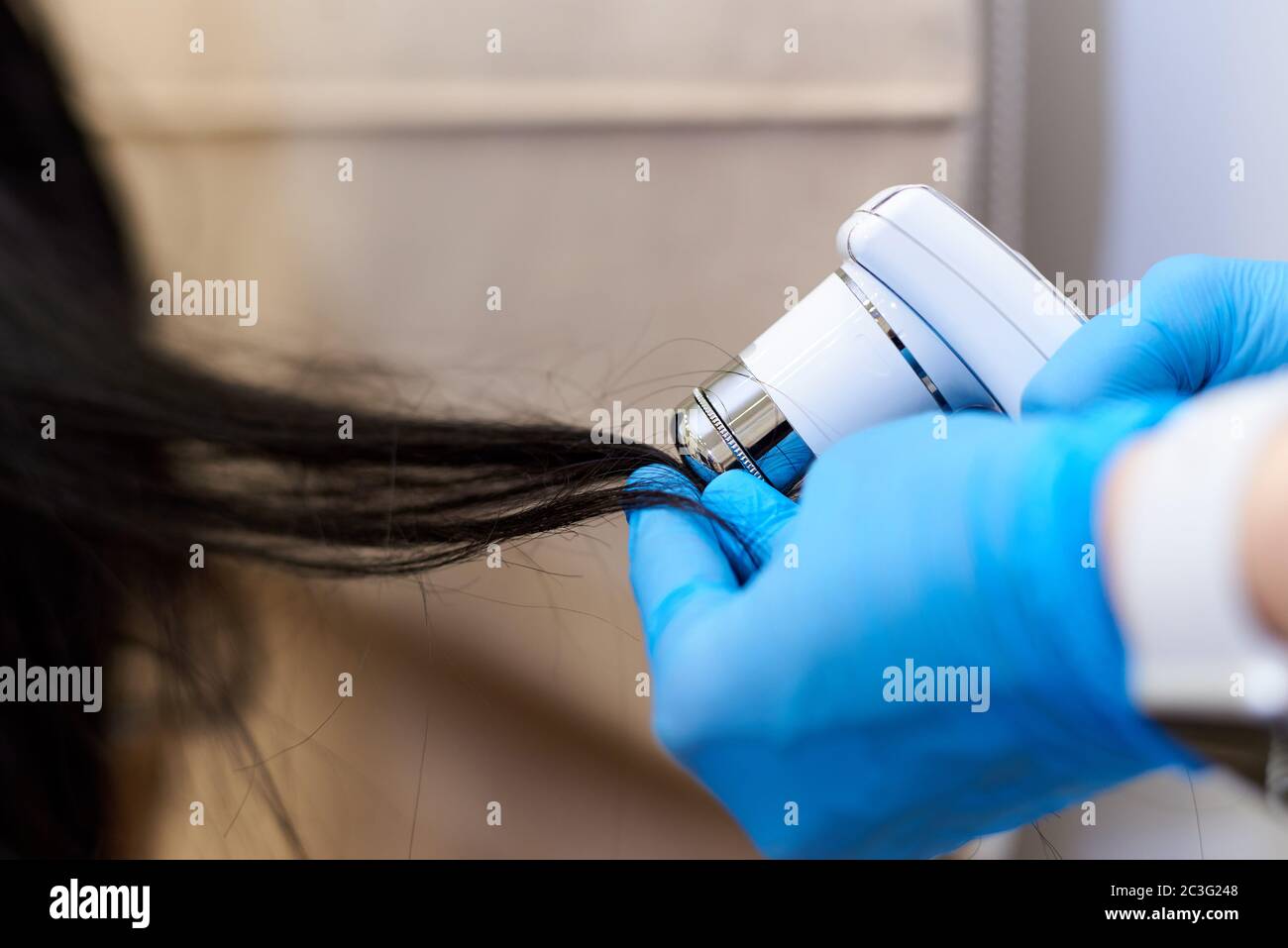 Microscopic examination of the hair and skin of the scalp Stock Photo ...