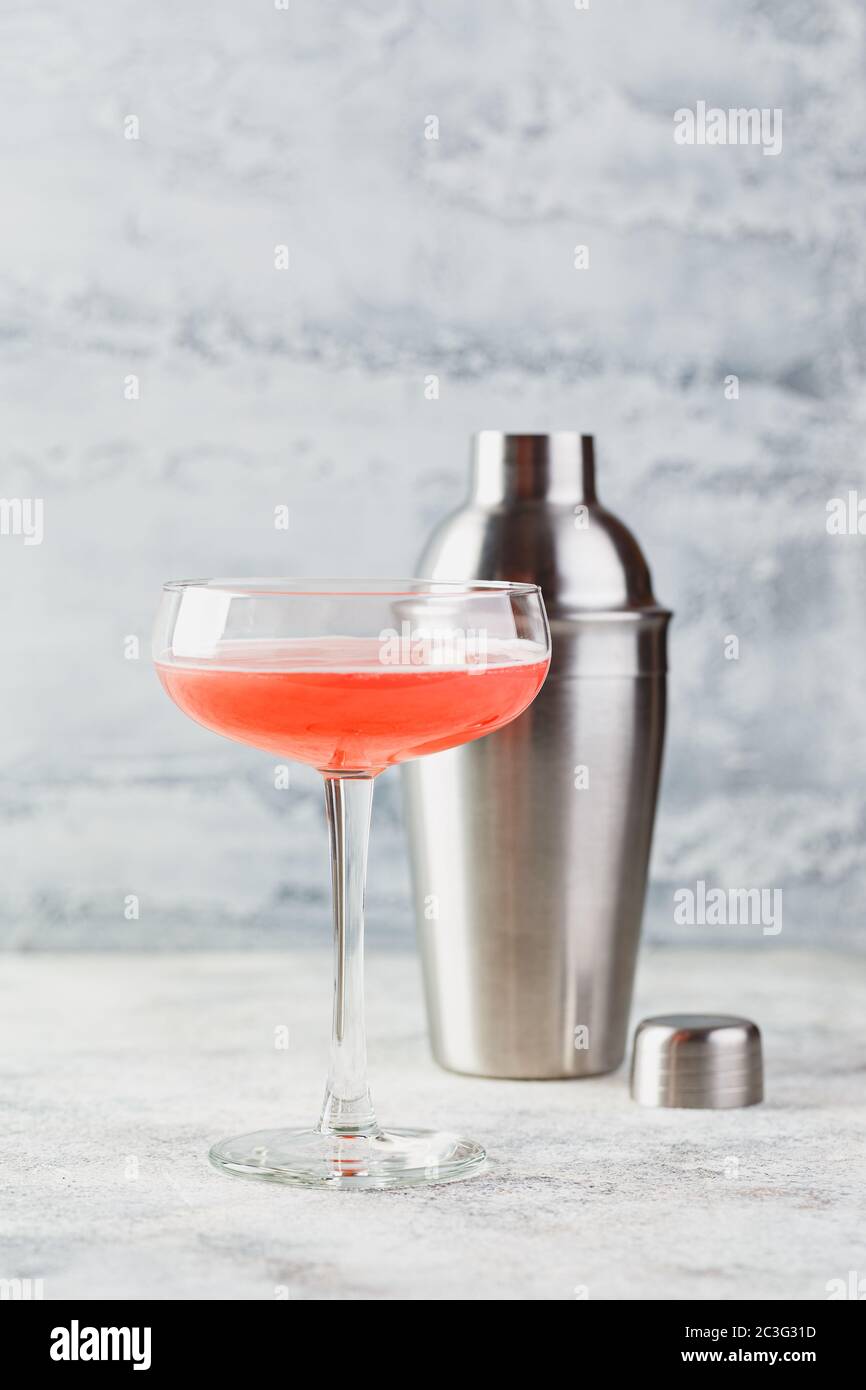Pink Raspberry Cocktail in drink glass Stock Photo - Alamy