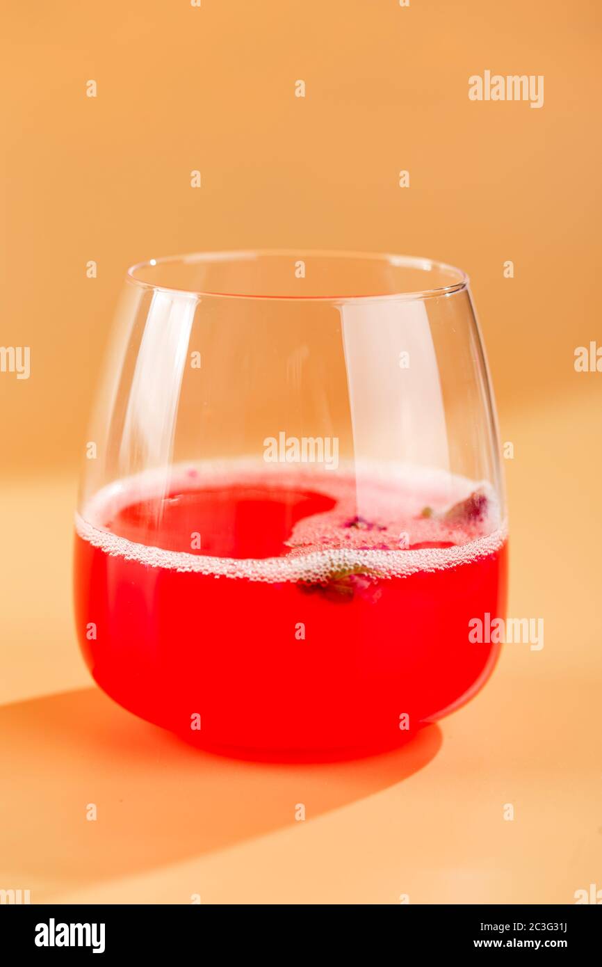 Pink Raspberry Cocktail in drink glass Stock Photo - Alamy