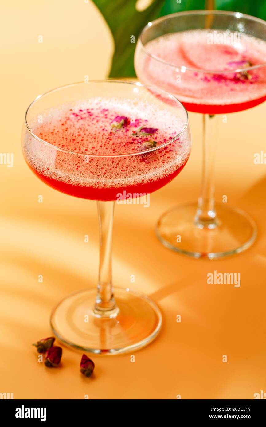 Pink Raspberry Cocktail in drink glass Stock Photo - Alamy