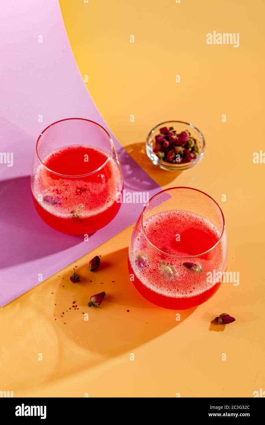 Pink Raspberry Cocktail in drink glass Stock Photo - Alamy