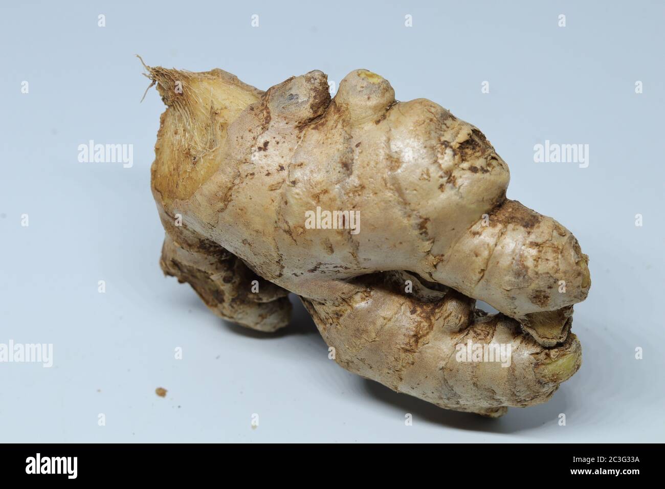 fresh ginger isolated on white background Stock Photo - Alamy