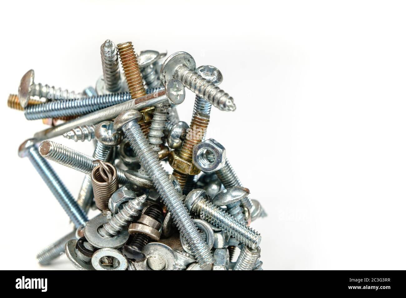bolts, nuts and springs on white background Stock Photo - Alamy