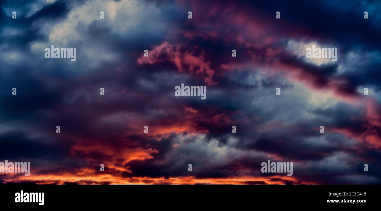 dark red clouds sky on sunset Stock Photo - Alamy