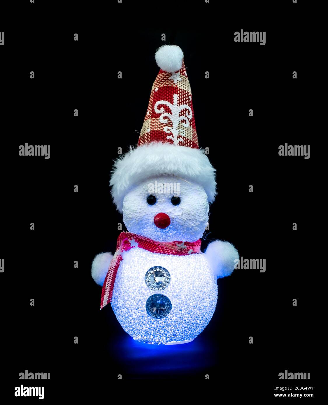 snowman made of polystyrene on black background Stock Photo - Alamy