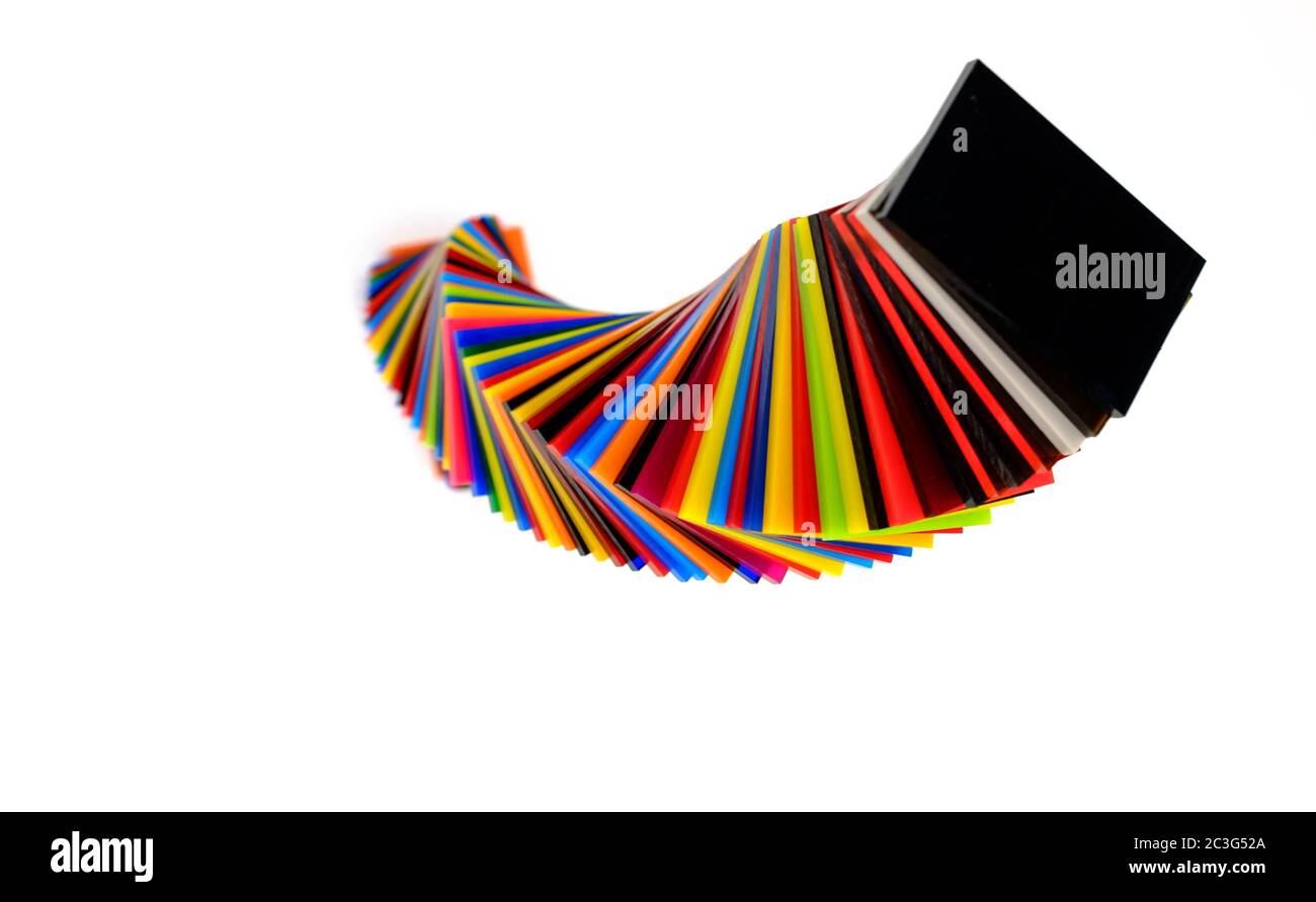 spiral Stack of different colours Cast Acrylic Sheet on white ...