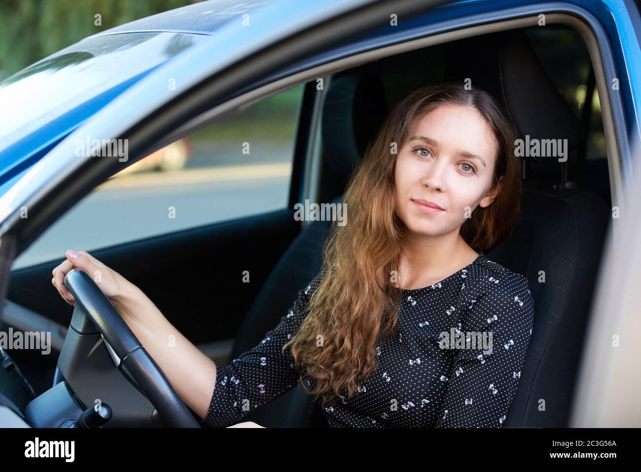 Car insurance driver. Pretty girl. Beauty lady inside. Drive school ...