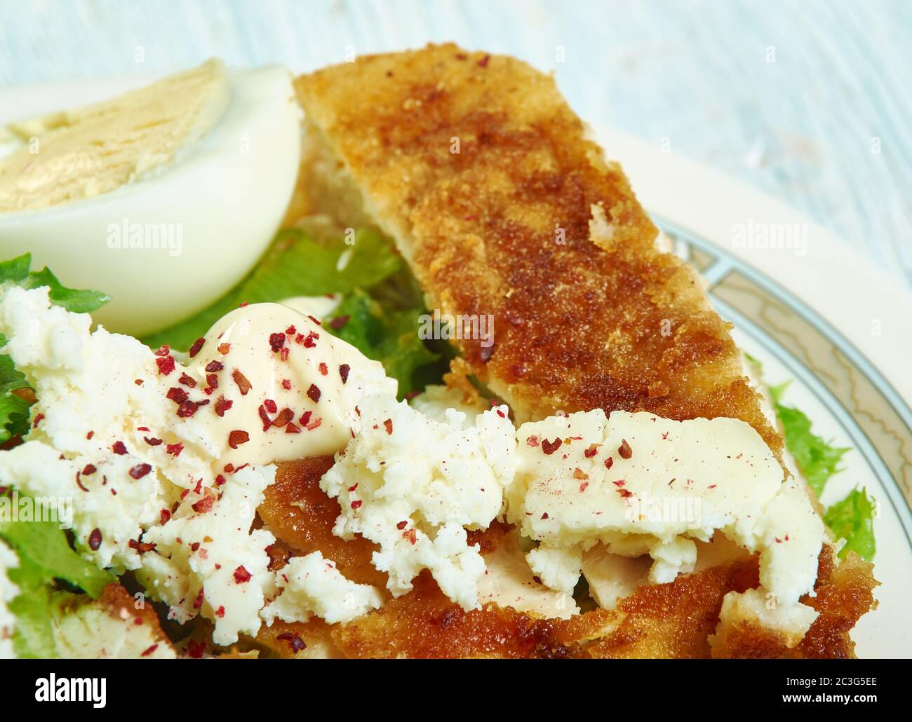 Chicken schnitzel Caesar Stock Photo - Alamy