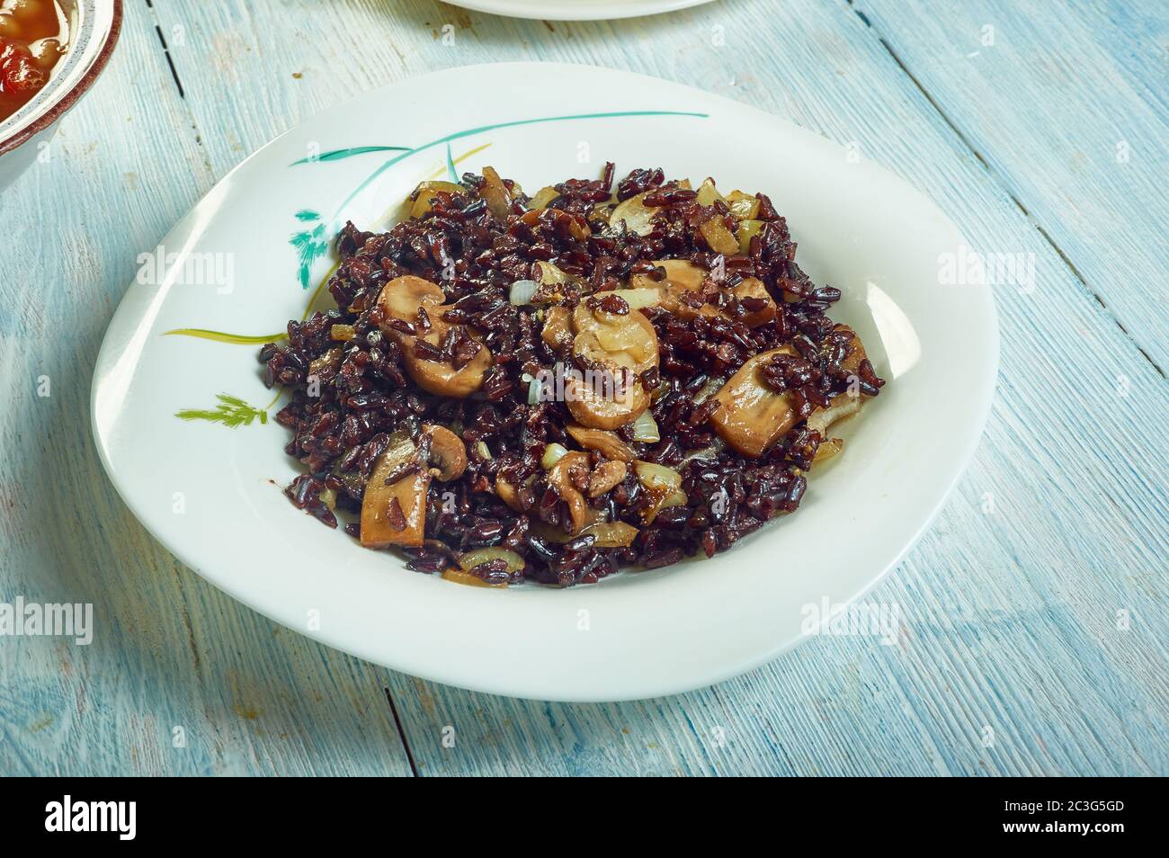 Black Rice Risotto with Mushrooms Stock Photo - Alamy