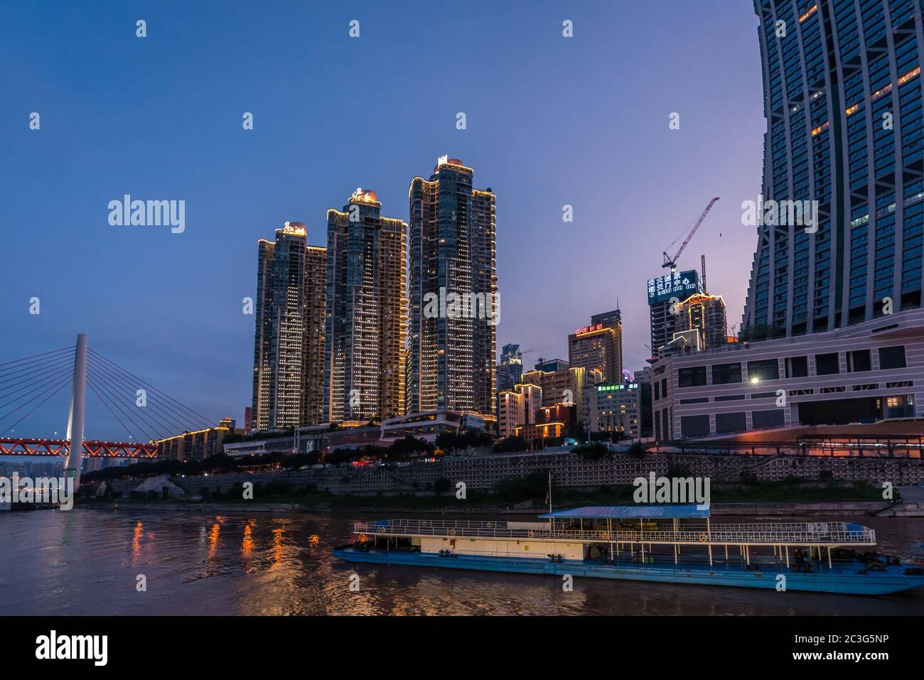 Riverside buildings in Chongqing city at sunset Stock Photo - Alamy