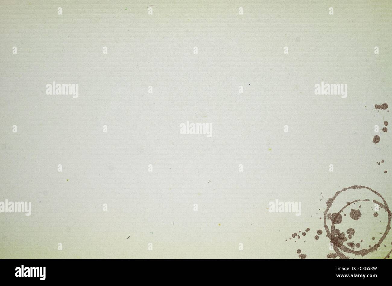 Sheet of paper with coffee ring stains and smudges Stock Photo - Alamy
