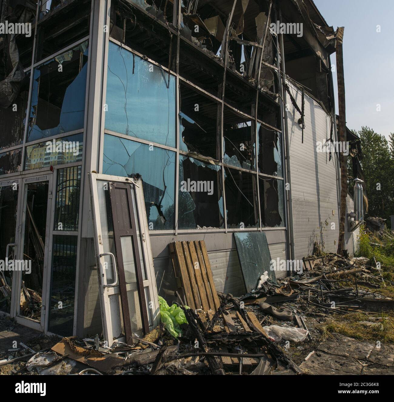 Burned construction with broken windows in summer Stock Photo - Alamy