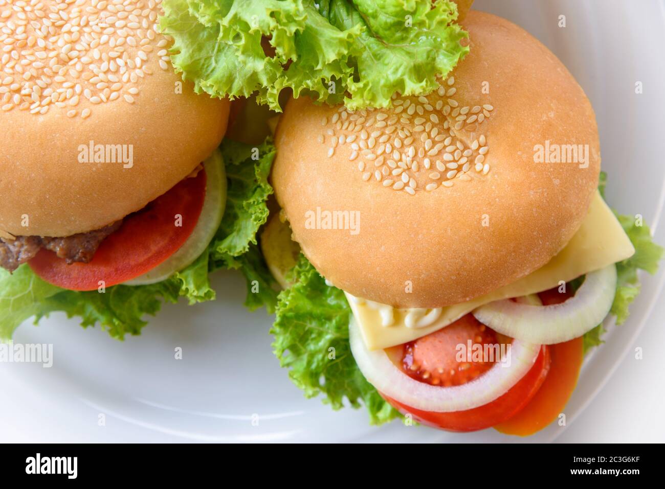 Top view two hamburger on a white plate Stock Photo - Alamy