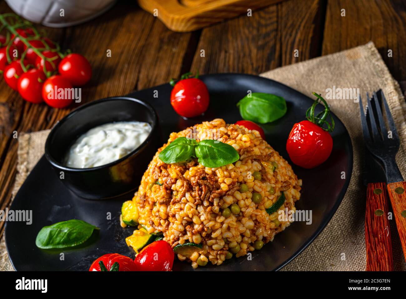 rustic bulgur fried with minced meat and vegetables Stock Photo - Alamy