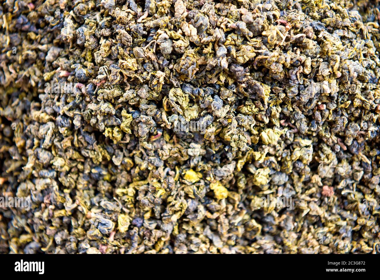 Texture of dry green tea as background Stock Photo - Alamy