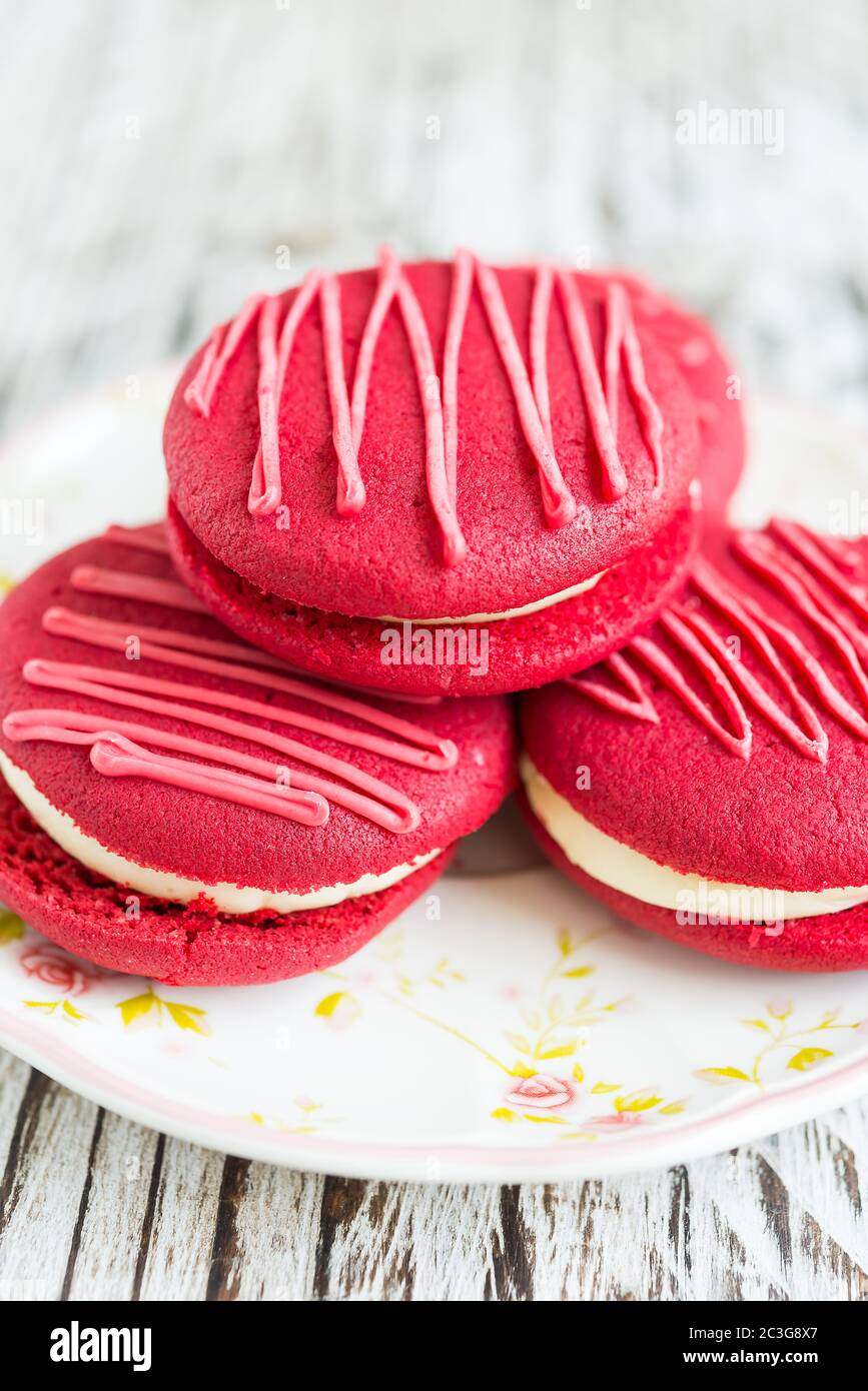 Red velvet macaroon Stock Photo - Alamy