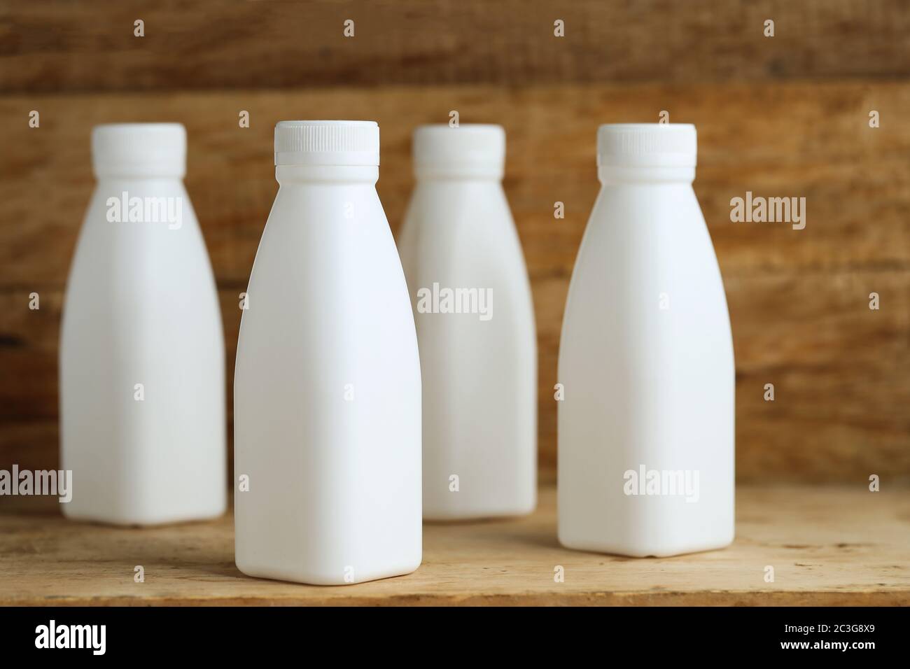 Plastic milk bottles hi-res stock photography and images - Alamy