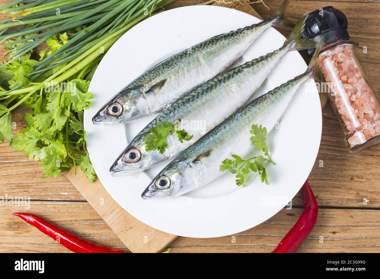 raw mackerel with and spices Stock Photo - Alamy