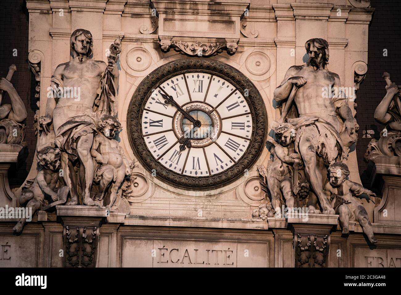 Old clock with statues at the City hall building in Paris, France Stock ...