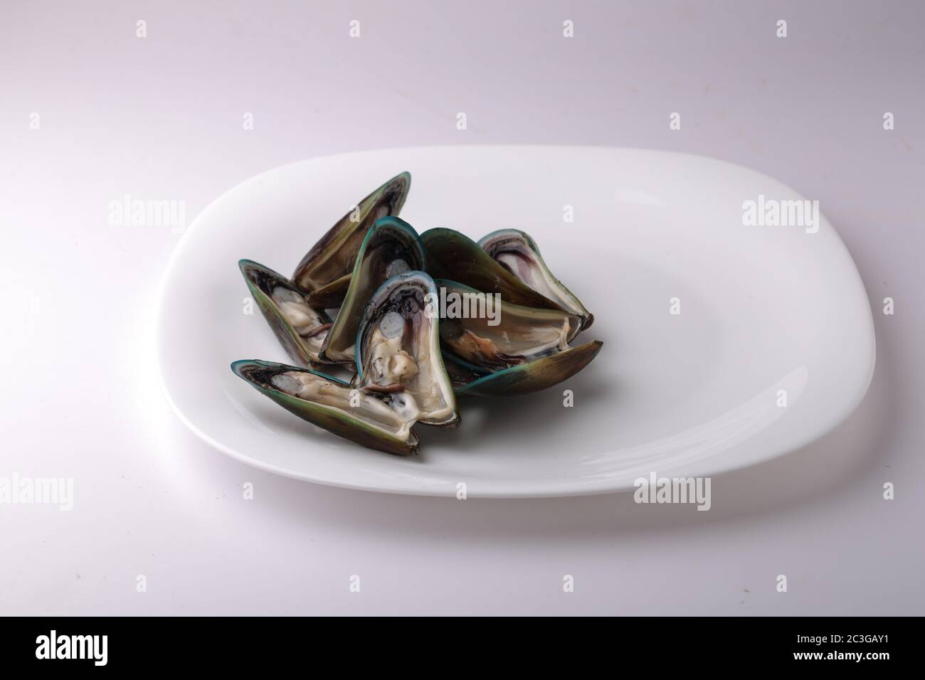 Kerala raw Mussels,kerala raw shell fishes arranged in a white plate ...