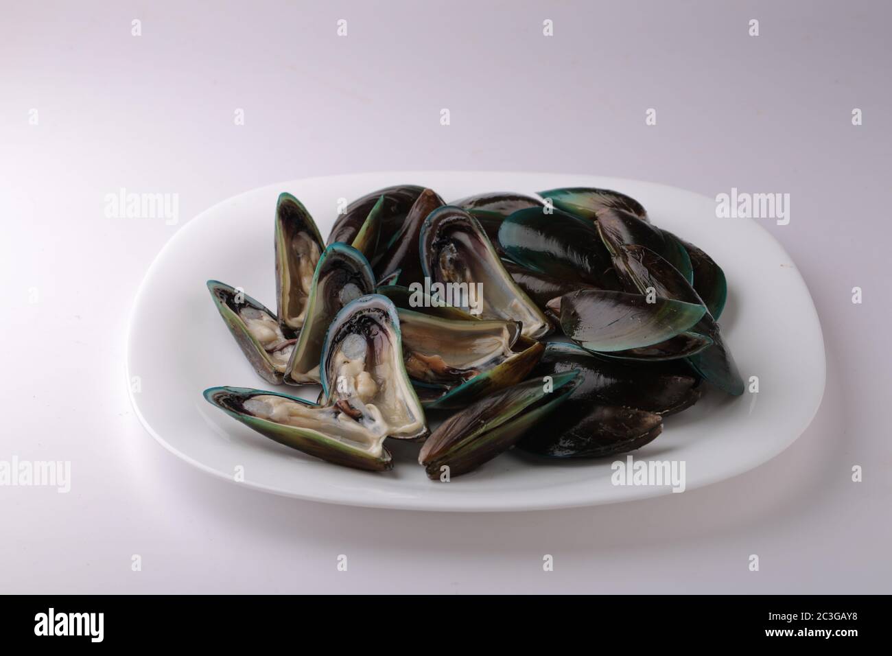 Kerala raw Mussels,kerala raw shell fishes arranged in a white plate ...