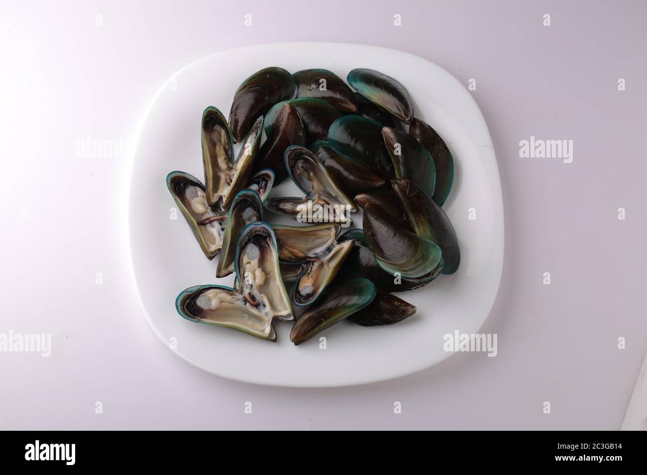 Kerala raw Mussels,kerala raw shell fishes arranged in a white plate ...