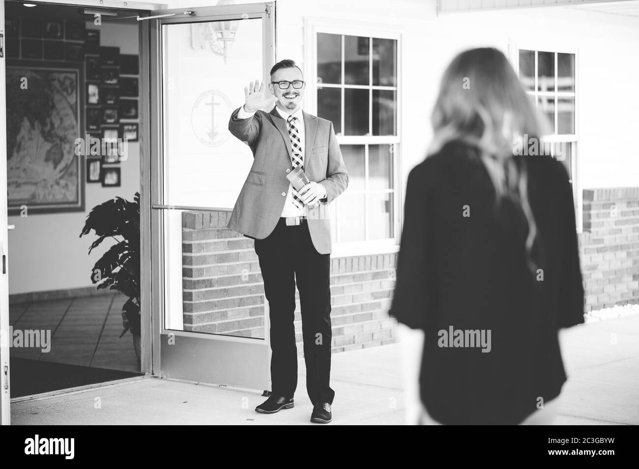 Welcoming attractive Black and White Stock Photos & Images - Alamy