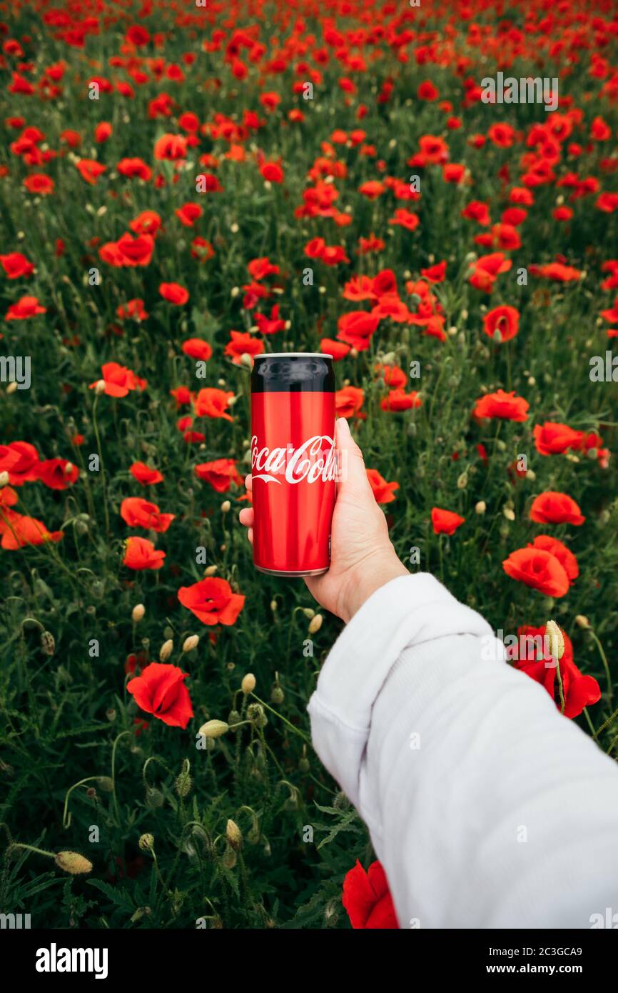 Hand holding coca cola bottle hi-res stock photography and images - Alamy
