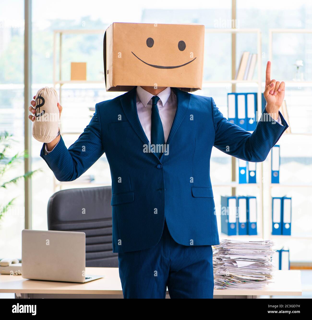 Happy man with box instead of his head Stock Photo - Alamy