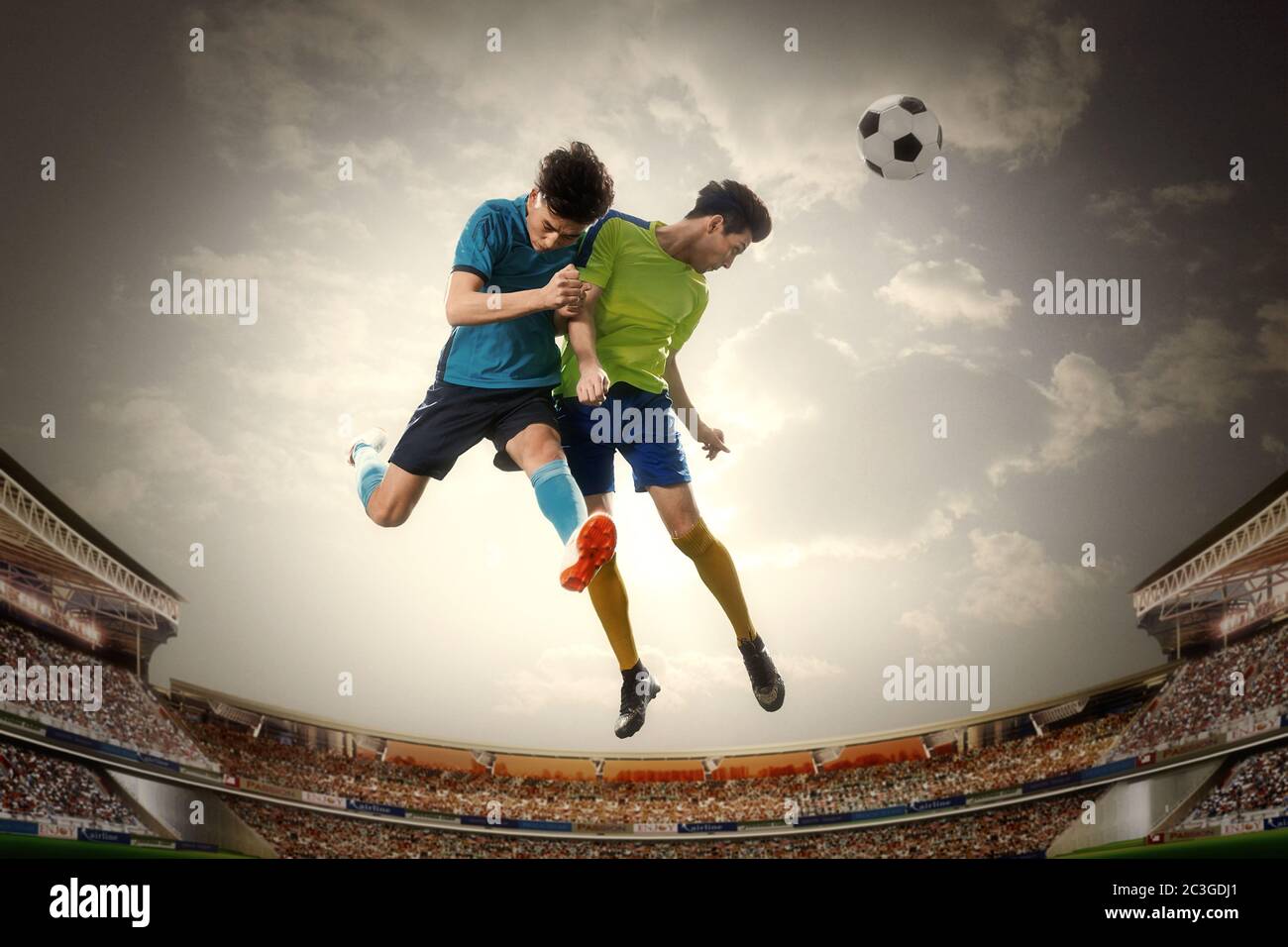 Two football players to play Stock Photo - Alamy