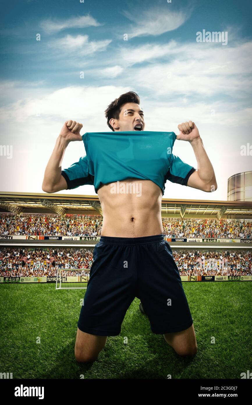 Football players celebrate winning Stock Photo - Alamy