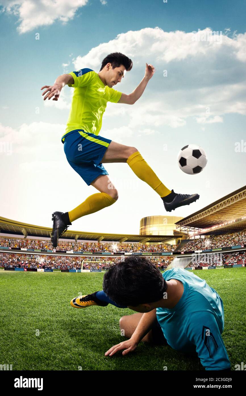 Two football players to play Stock Photo - Alamy