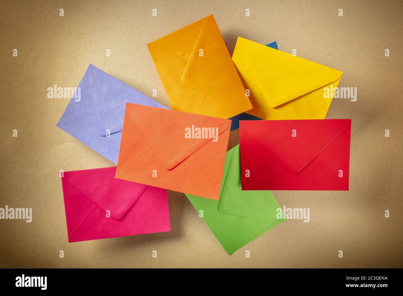 C6 envelopes flying over a brown kraft paper background, of various ...