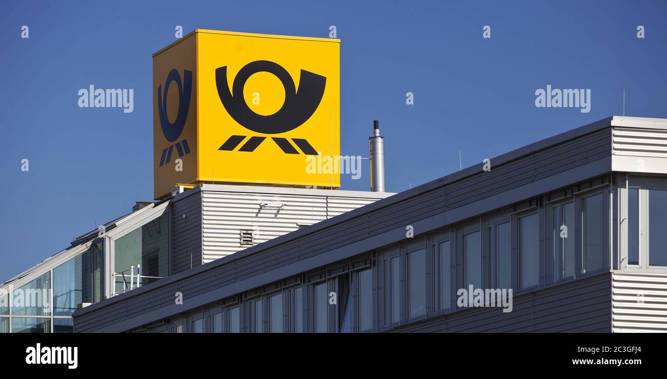 Posthorn, logo of the Deutsche Post at the Cologne West Mail Center ...