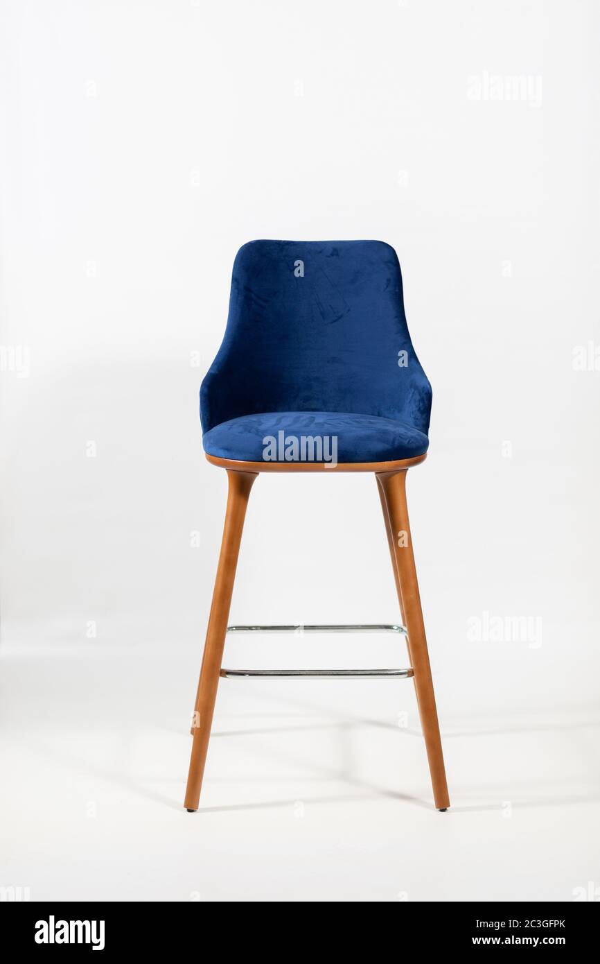 Vertical shot of a blue chair made up of wooden legs Stock Photo - Alamy