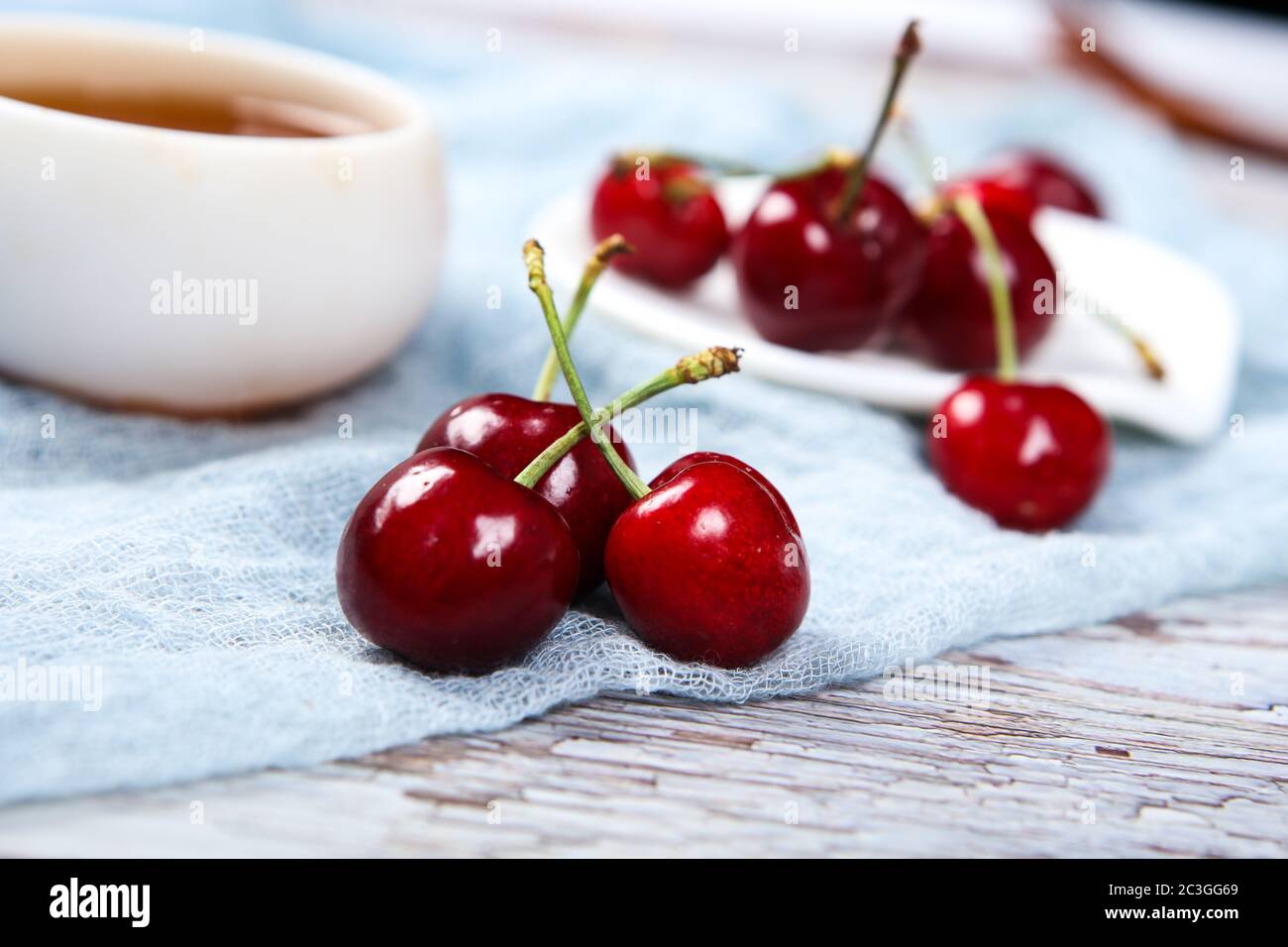 Cherry tea cup fruit hi-res stock photography and images - Alamy