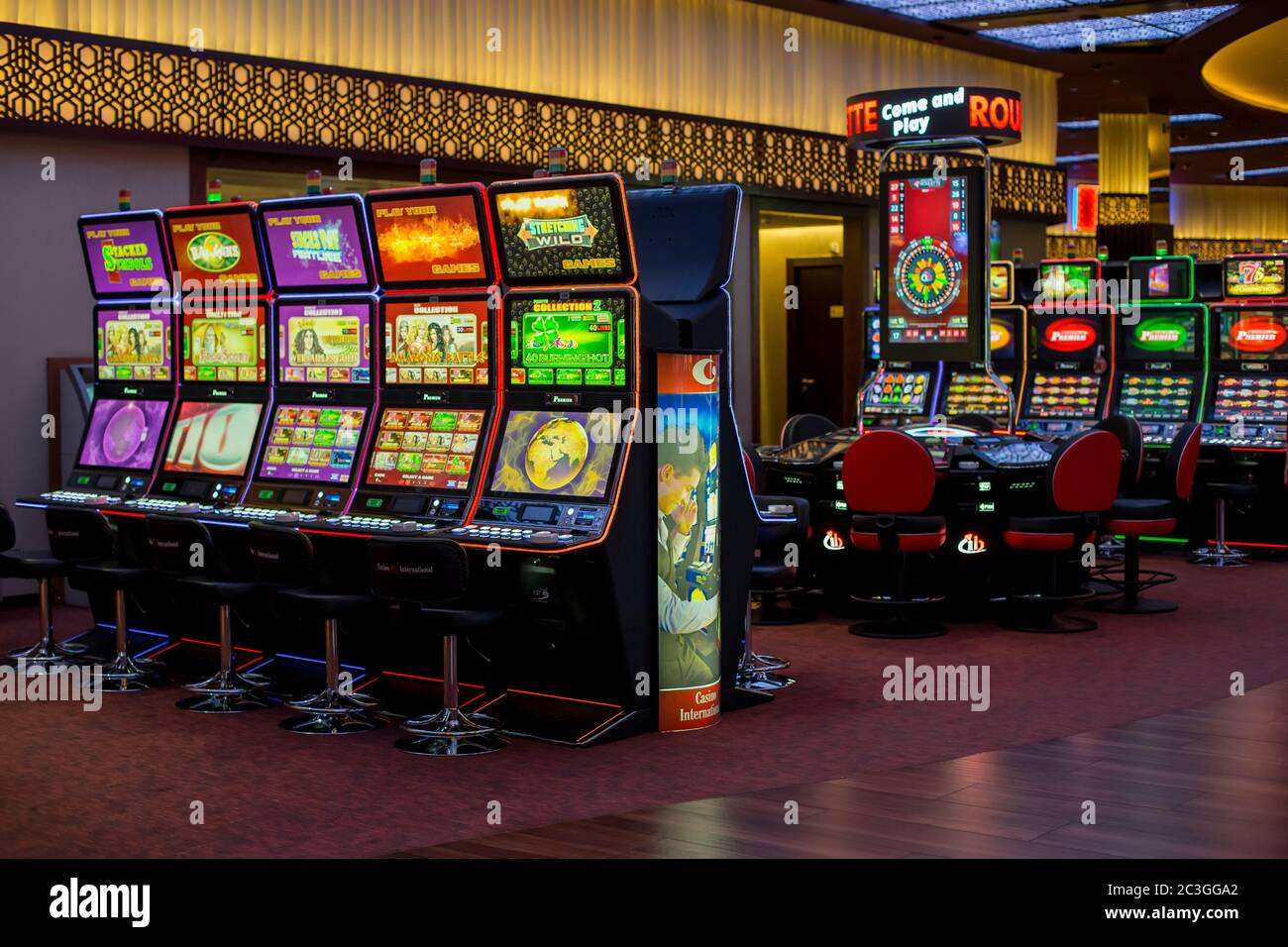 Slot machines in play room hi-res stock photography and images - Alamy