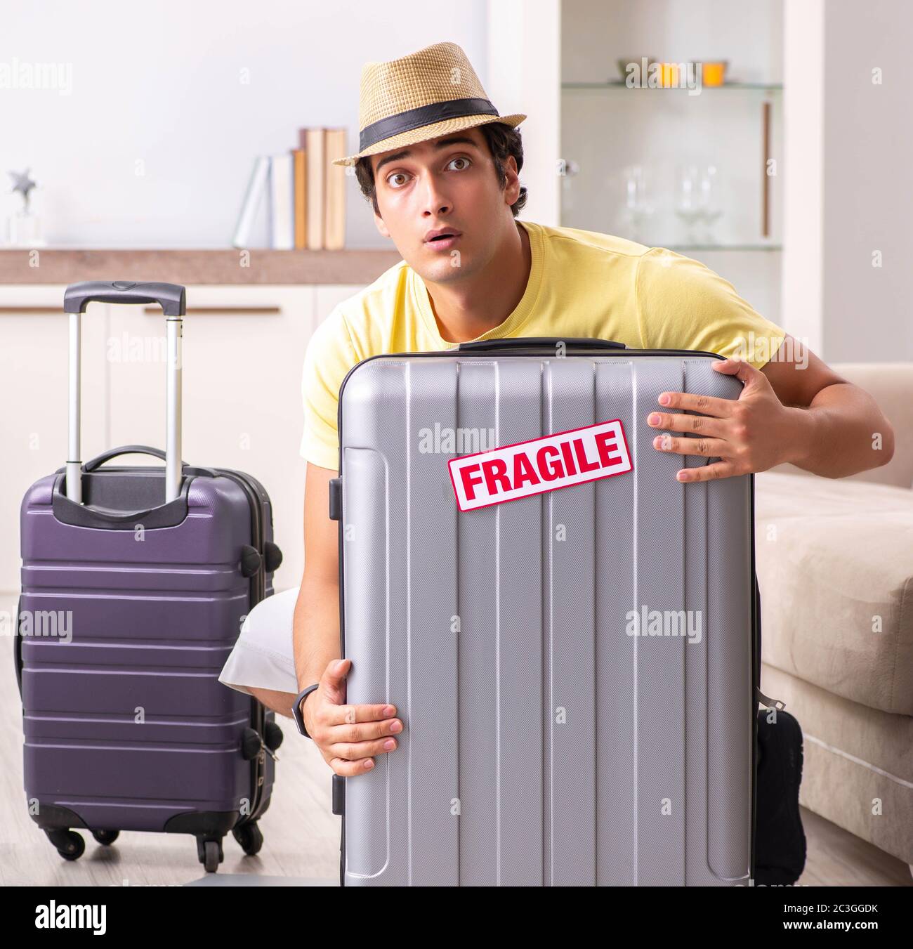 Fragile luggage hi-res stock photography and images - Alamy