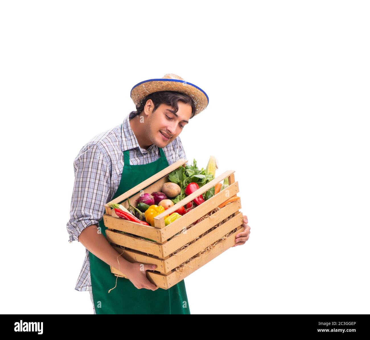 Young farmer with fresh produce isolated on white background Stock ...