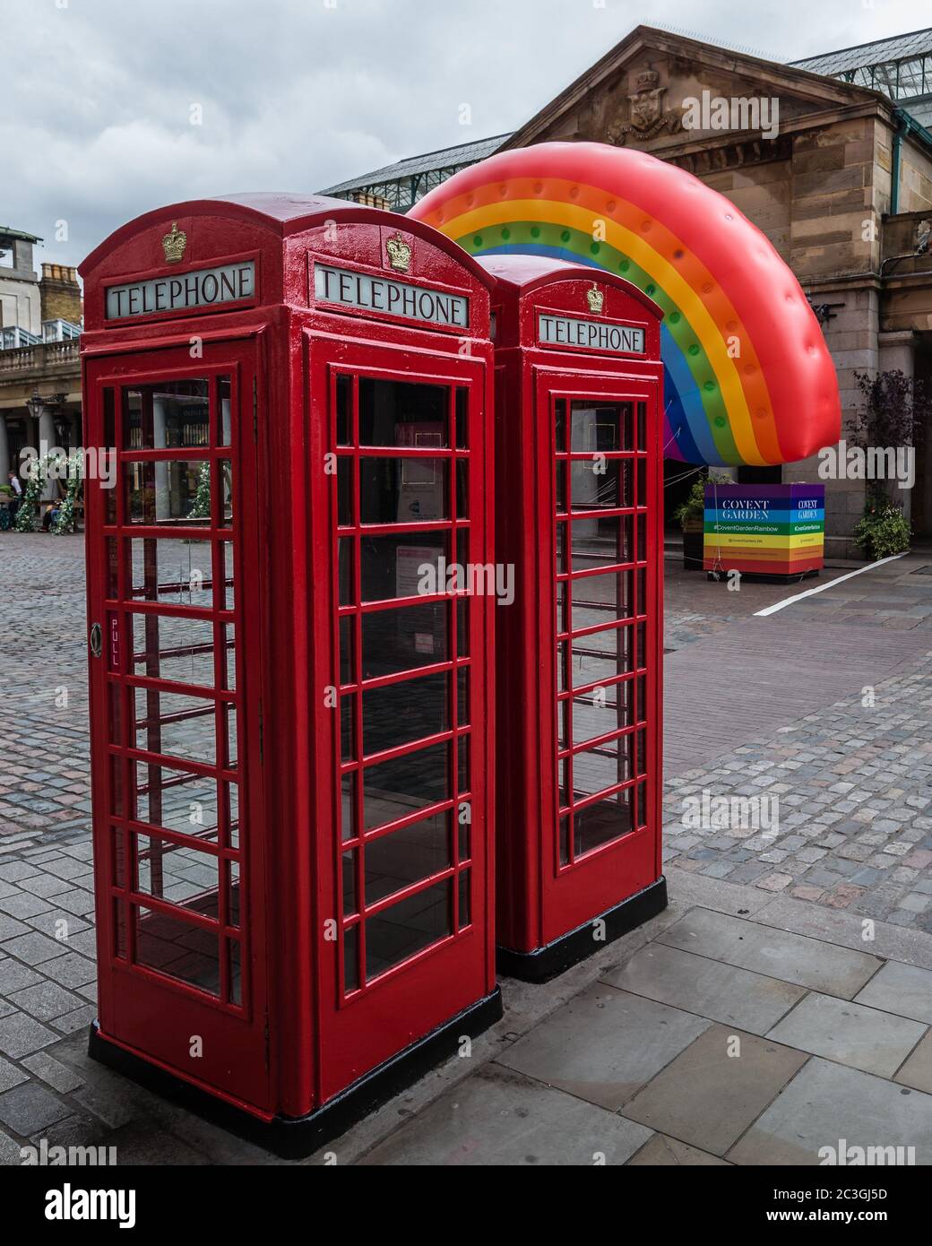 Iconic red telephone boxes and a Gay Pride rainbow in Covent Garden ...