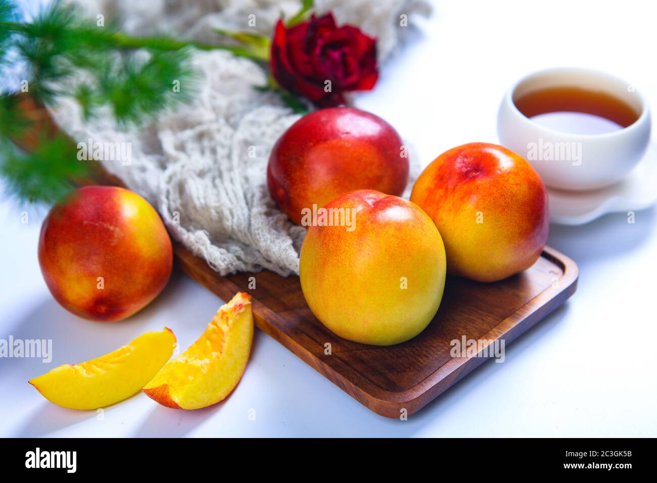 Yellow peach drink nutrition afternoon tea Stock Photo - Alamy