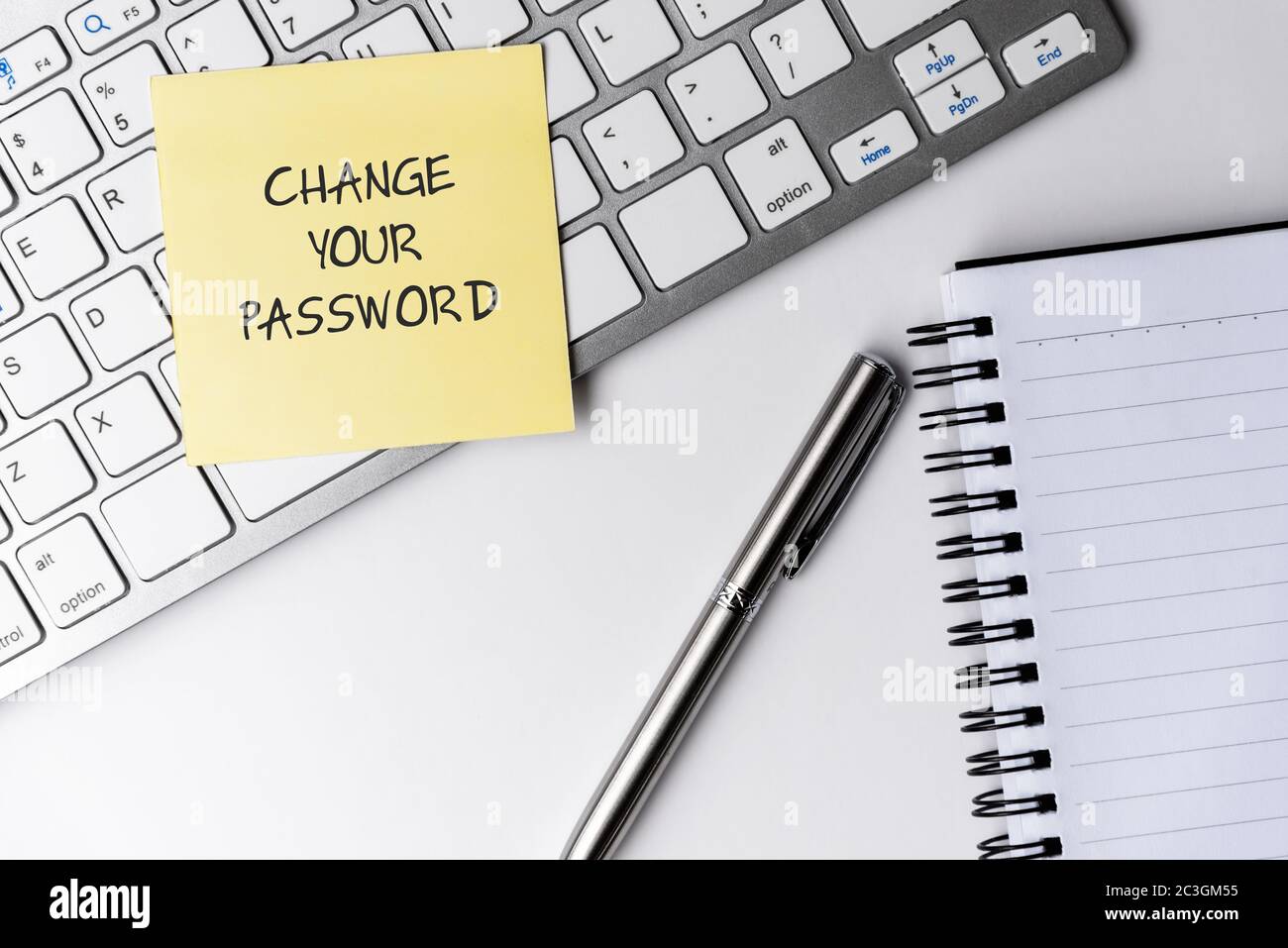 Change your password text on sticky note with computer keyboard and pen ...